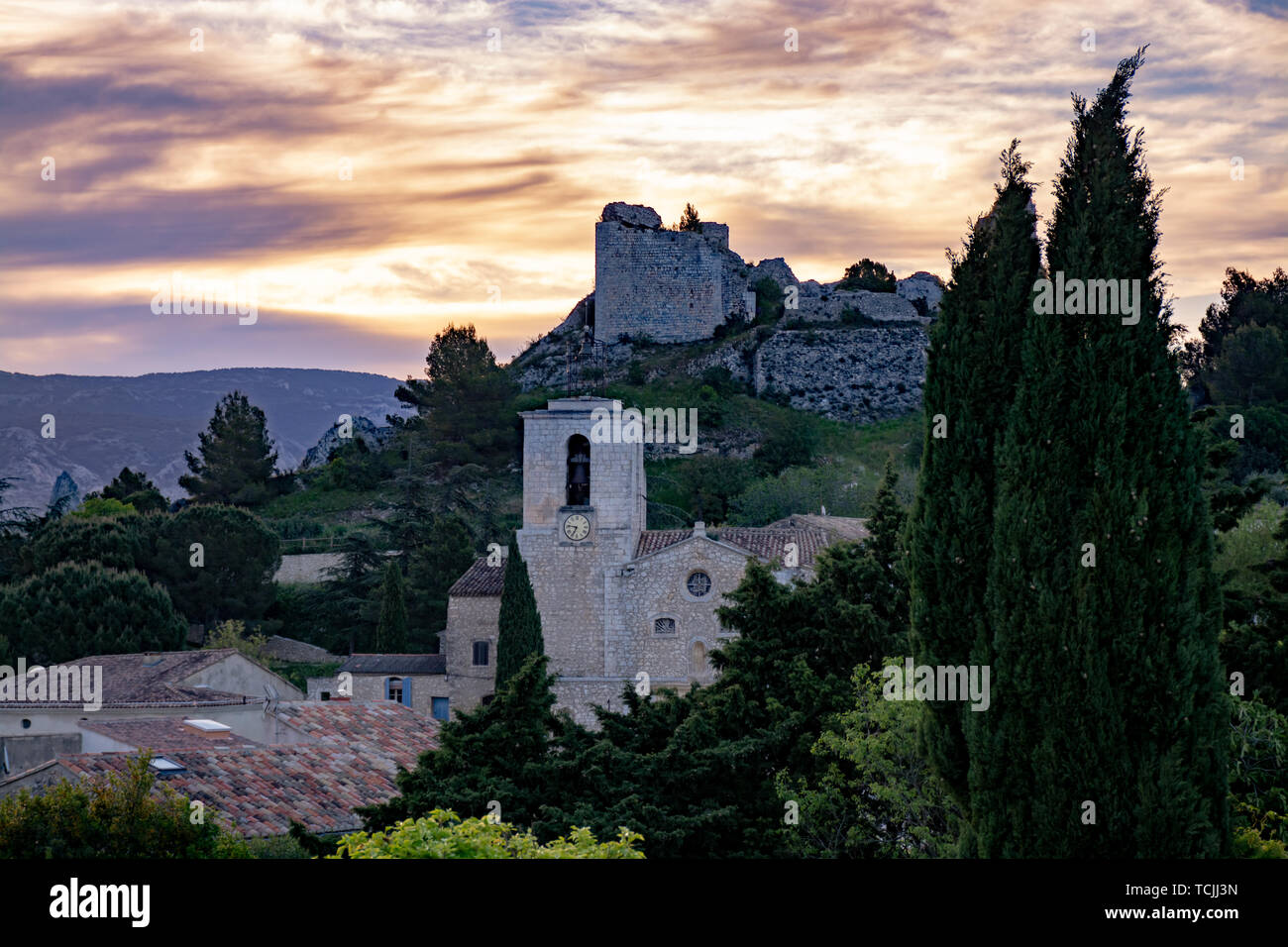 View on traditional medieval houses and castle ruines in Provence ...