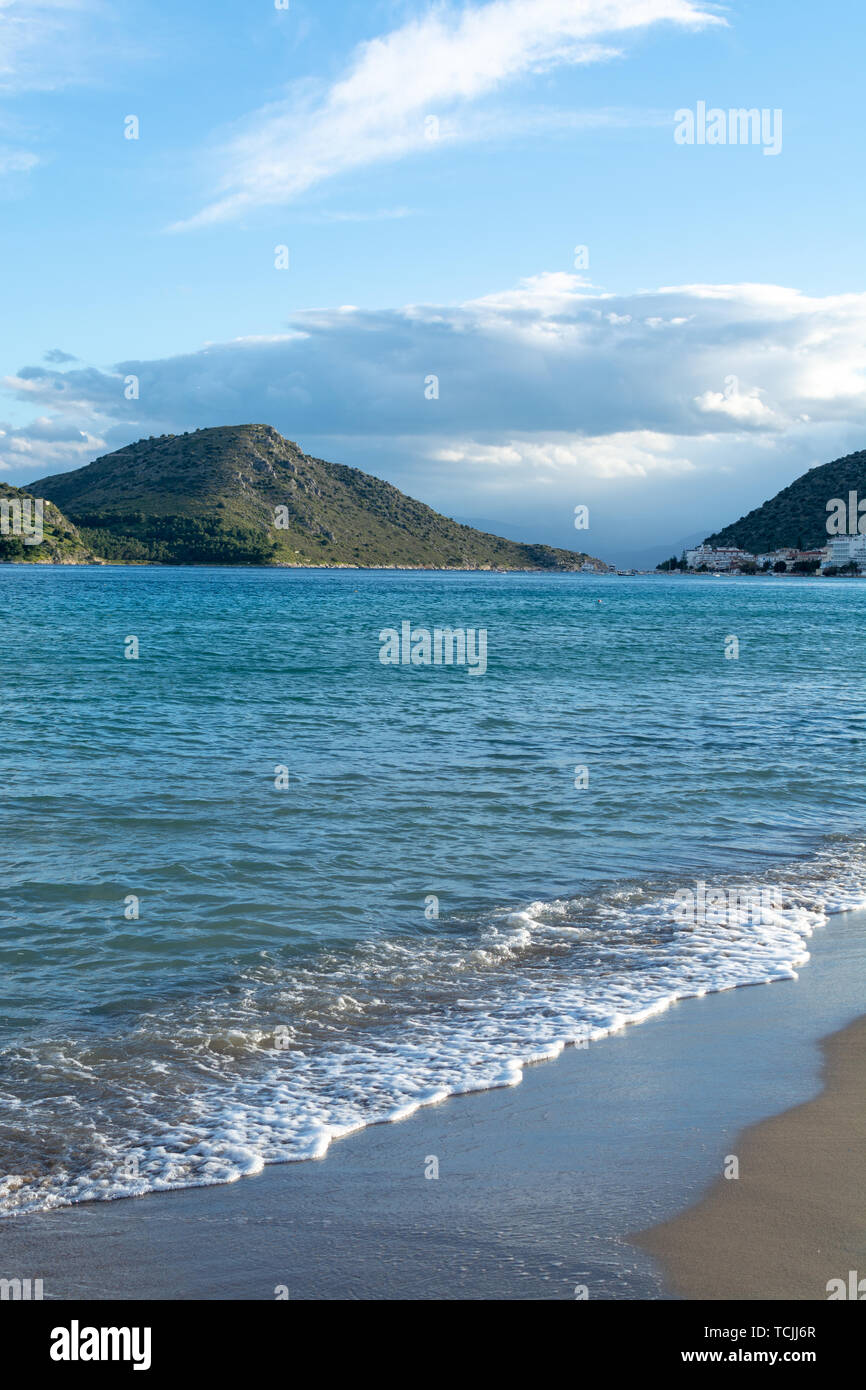 Small town Tolo, located near Nafplio in cozy sea bay with clear water ...