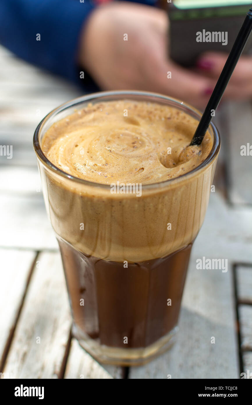 Traditional greek cold coffee Frappe with foam made from water, instant ...