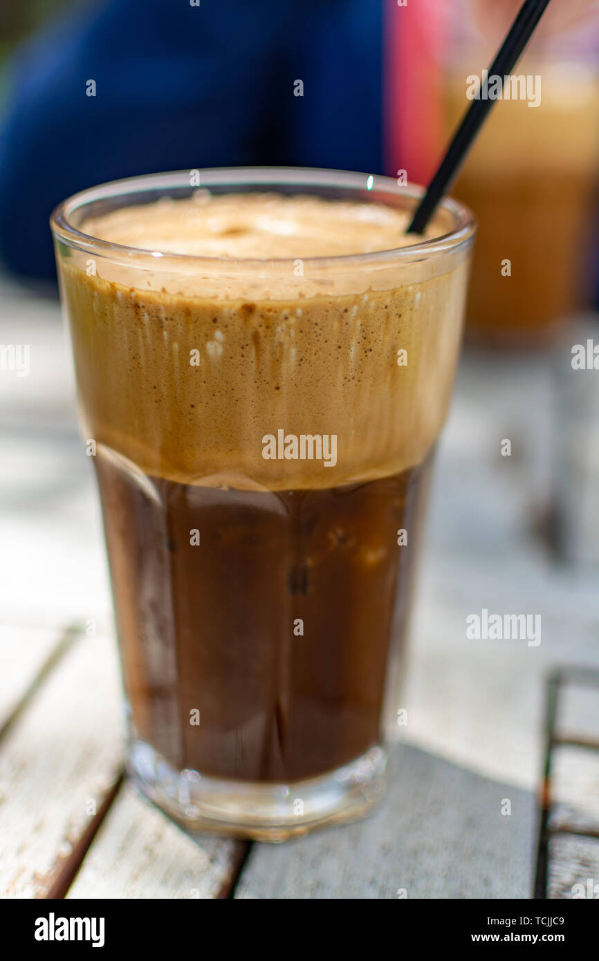 Traditional greek cold coffee Frappe with foam made from water, instant ...