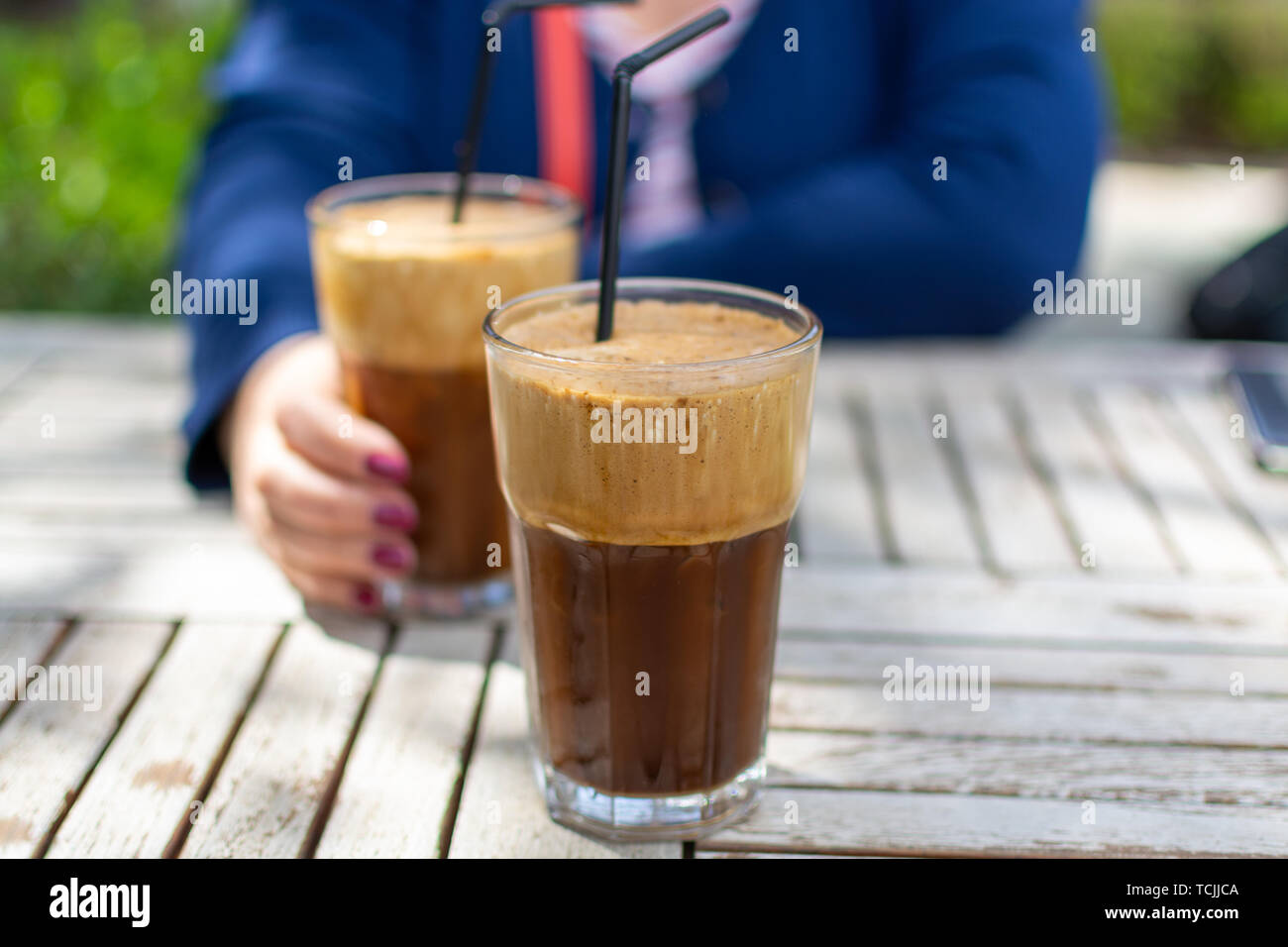 Traditional greek cold coffee Frappe with foam made from water, instant ...