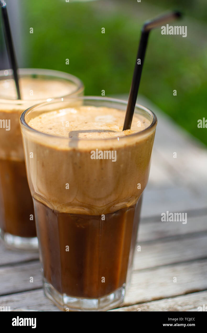 Traditional greek cold coffee Frappe with foam made from water, instant ...