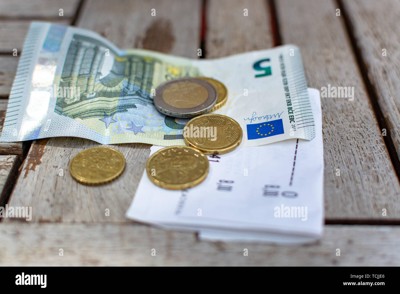Bill or receipt payment in outdoor cafe in Euro cash, banknote and ...