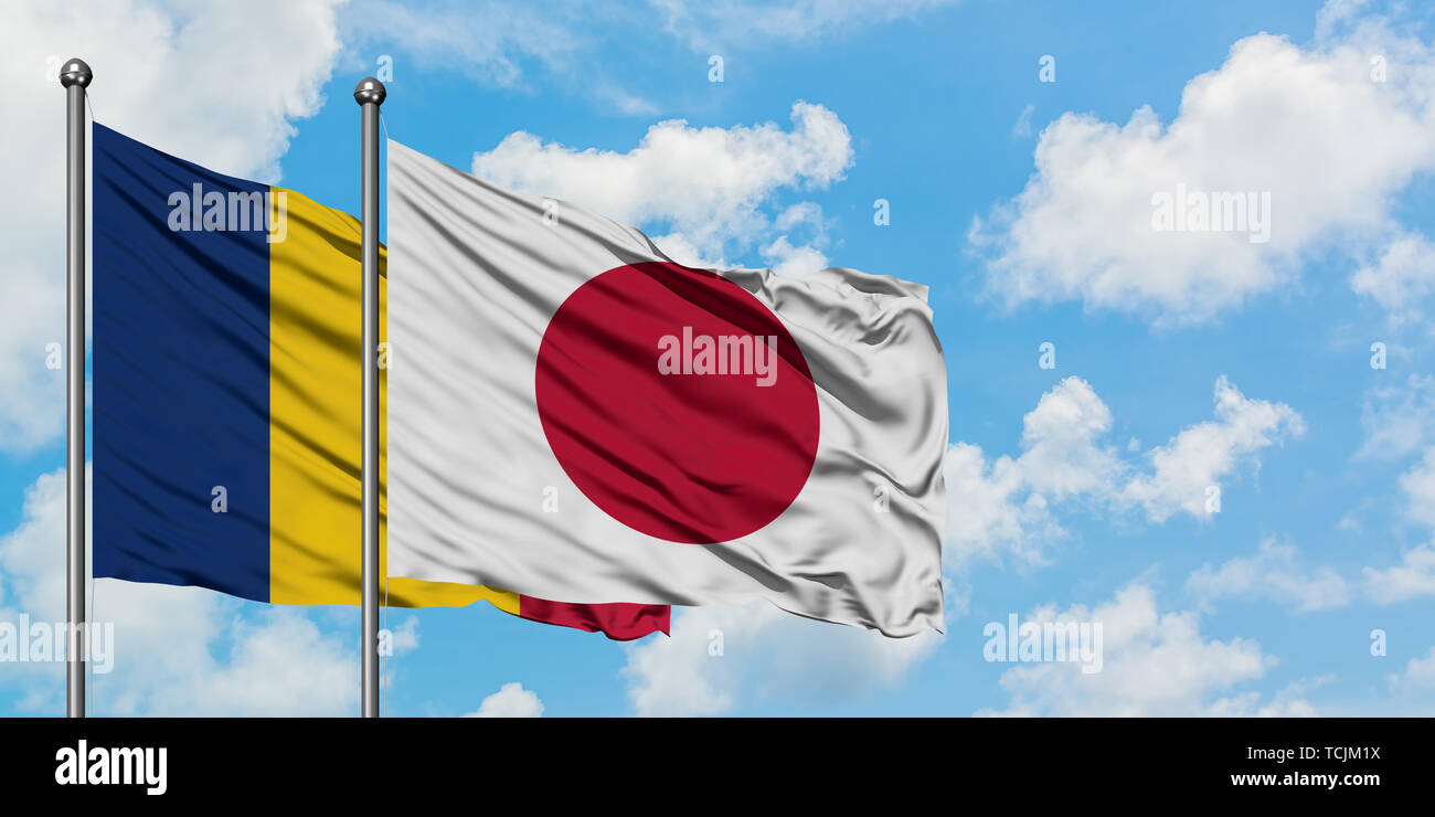 Chad and Japan flag waving in the wind against white cloudy blue sky ...