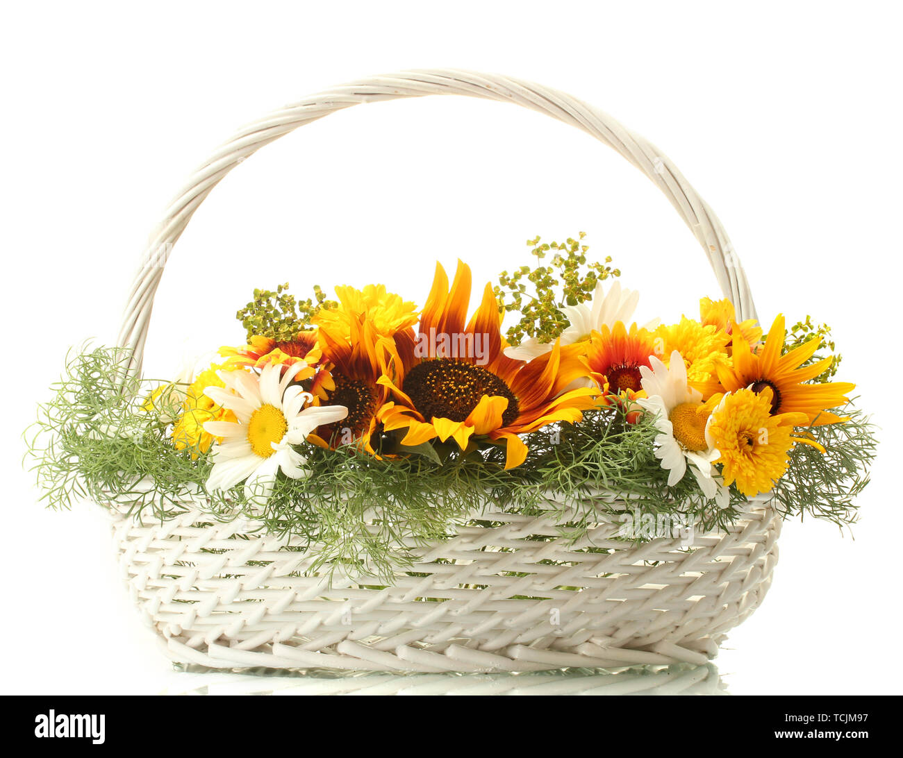 beautiful bouquet of bright wildflowers in basket, isolated on white ...