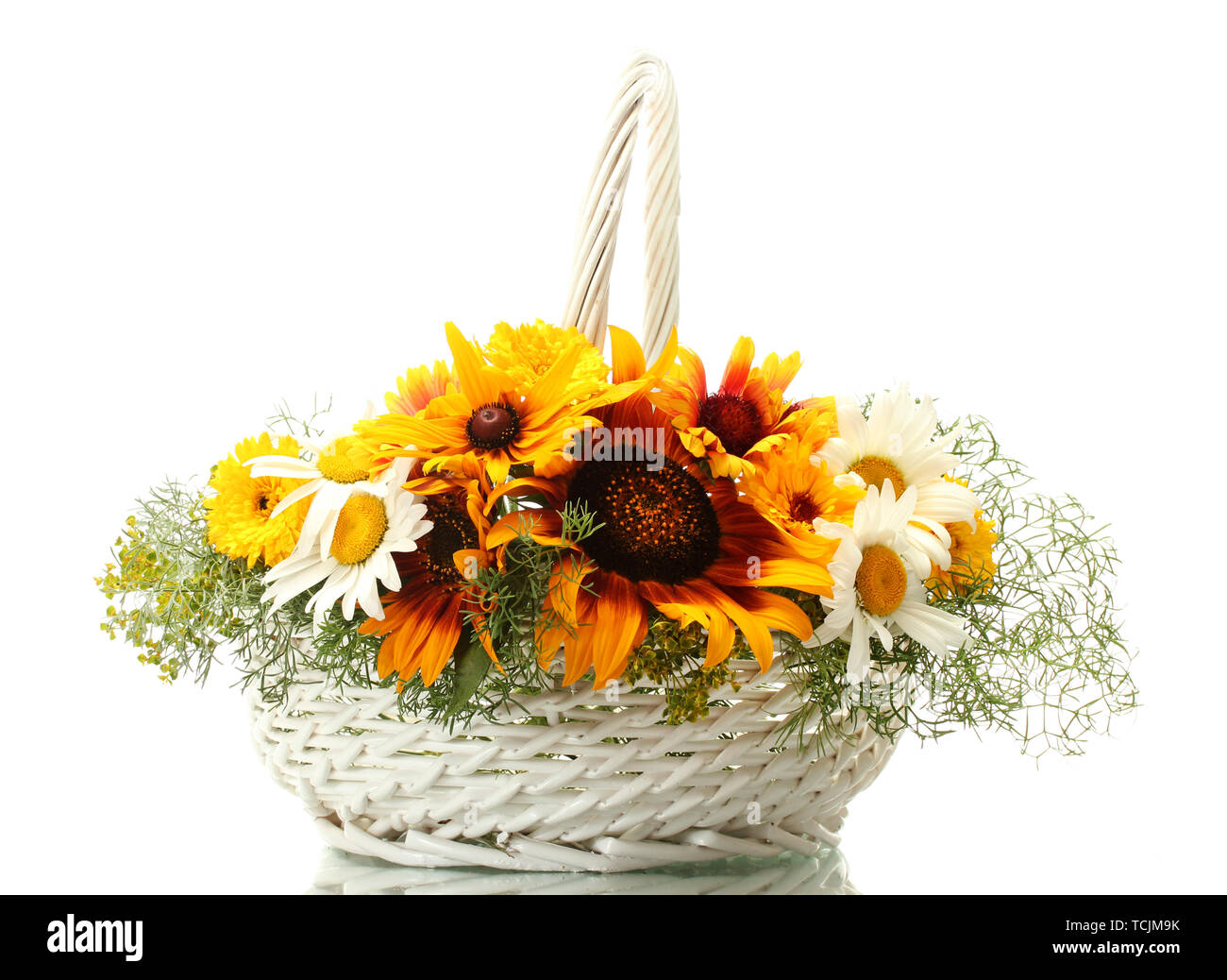 beautiful bouquet of bright wildflowers in basket, isolated on white ...