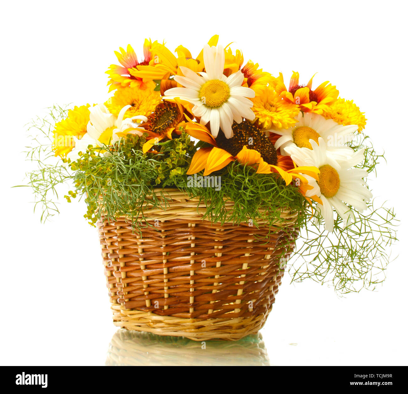 beautiful bouquet of bright wildflowers in basket, isolated on white ...
