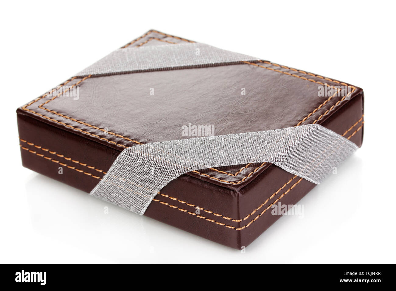 Brown box with ribbon isolated on white Stock Photo - Alamy