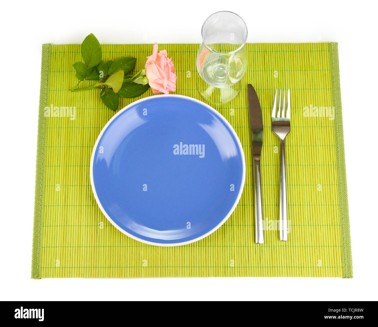 Table setting on a bamboo mat Stock Photo - Alamy