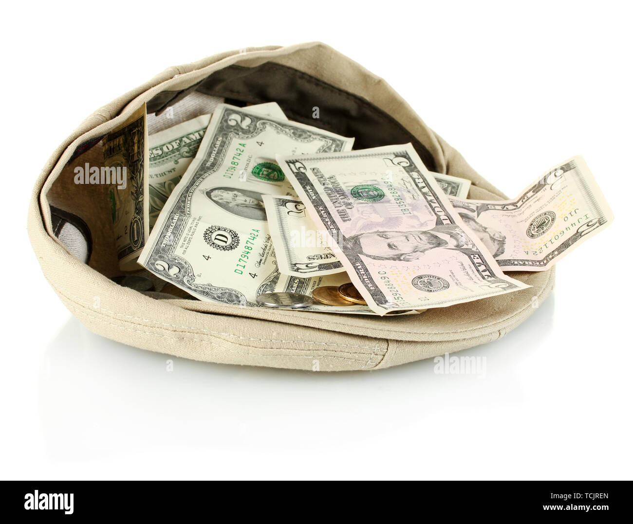 cap with money on a white background Stock Photo - Alamy