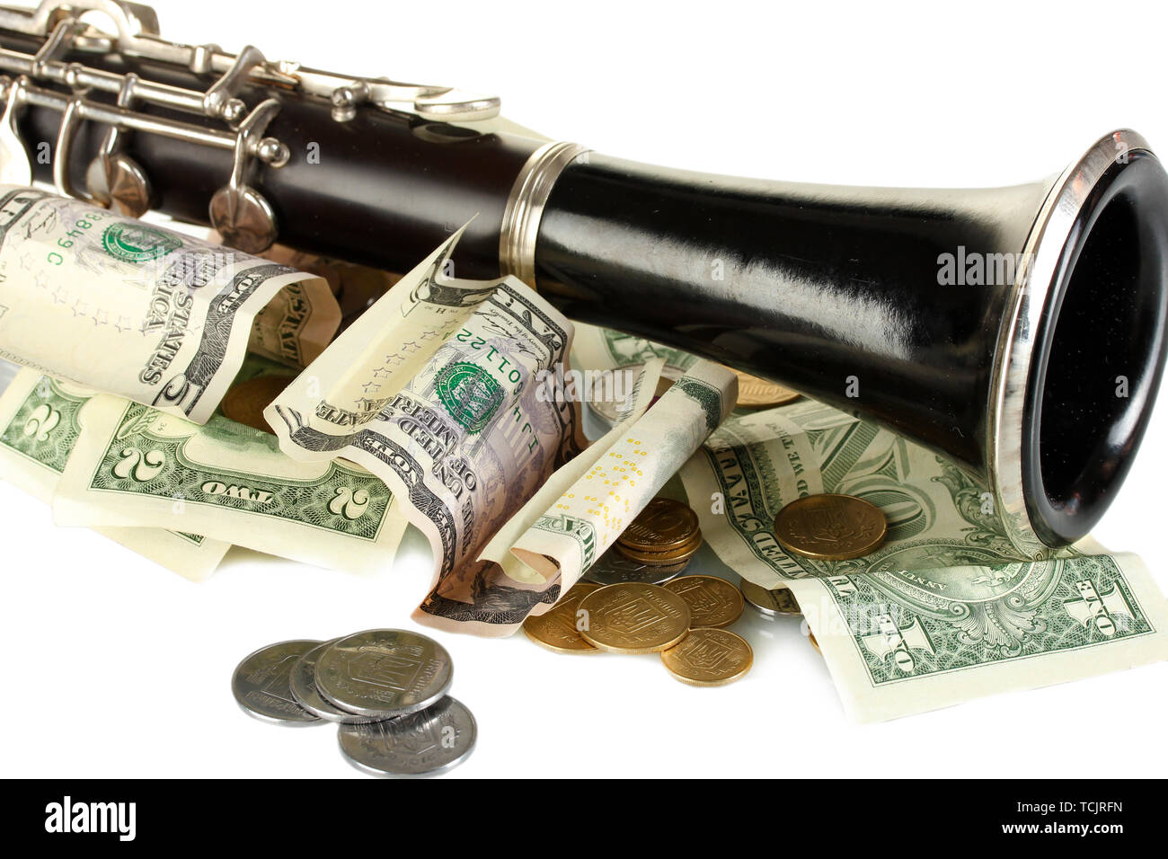 musical instrument with money isolated on white Stock Photo - Alamy