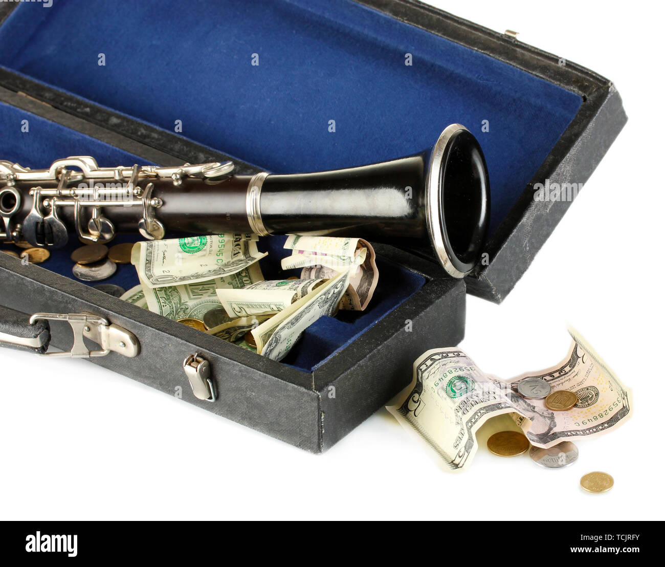 musical instrument with money isolated on white Stock Photo - Alamy