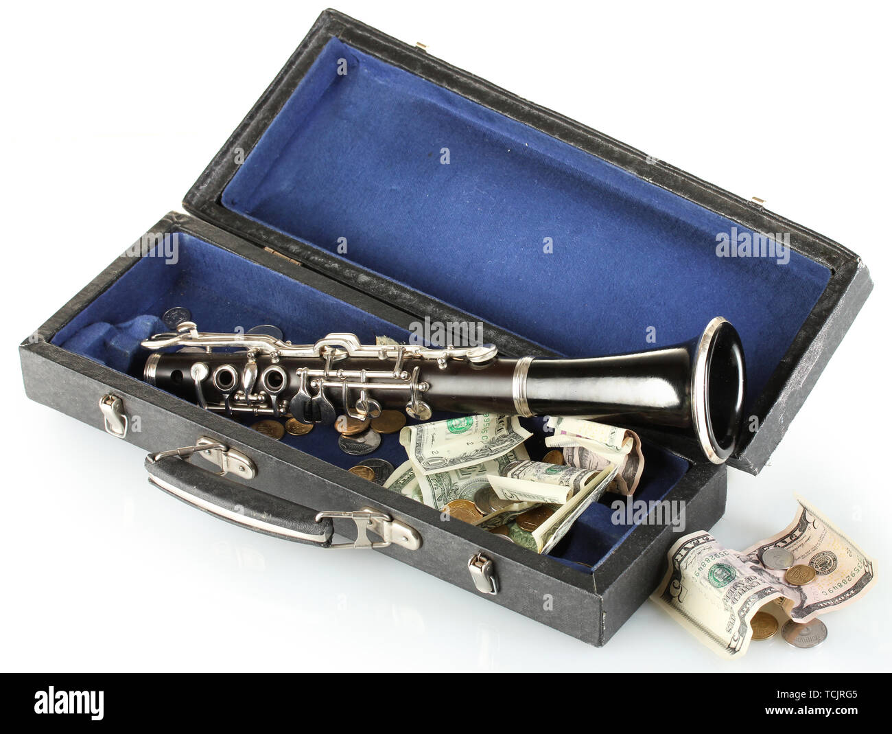 musical instrument with money isolated on white Stock Photo - Alamy