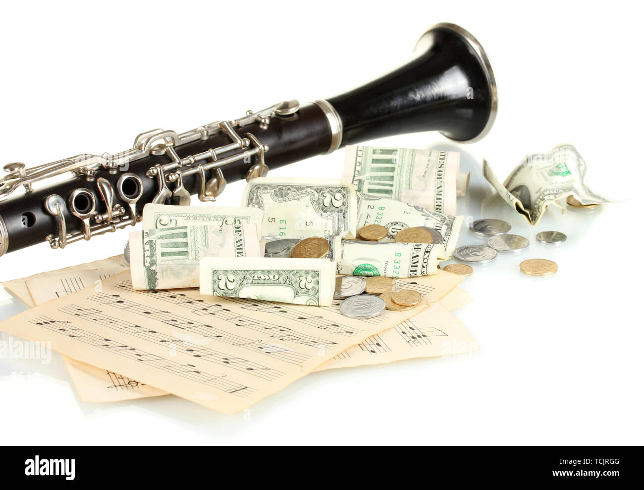 musical instrument with money isolated on white Stock Photo - Alamy