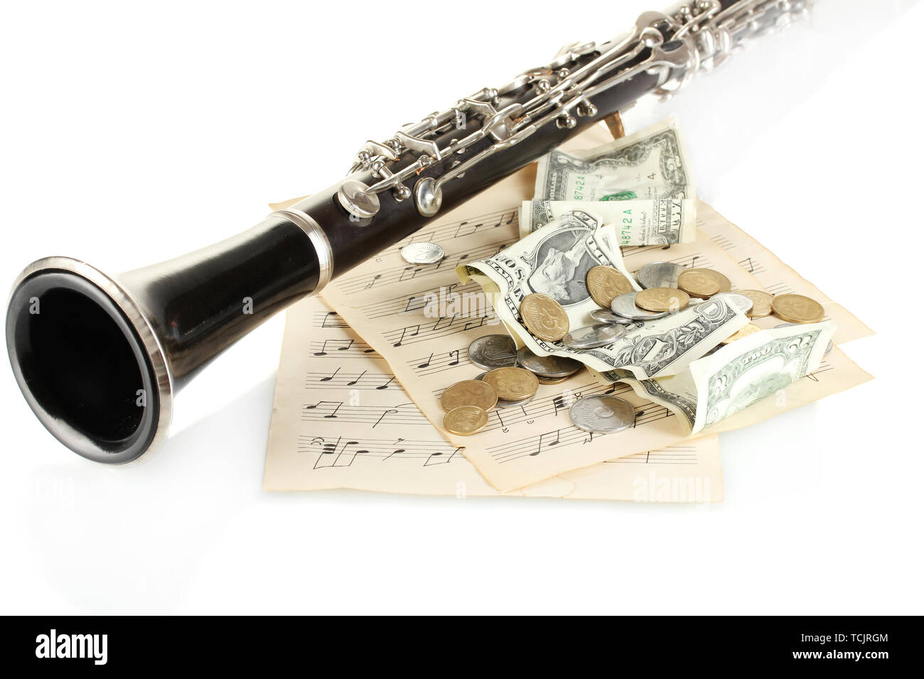 musical instrument with money isolated on white Stock Photo - Alamy