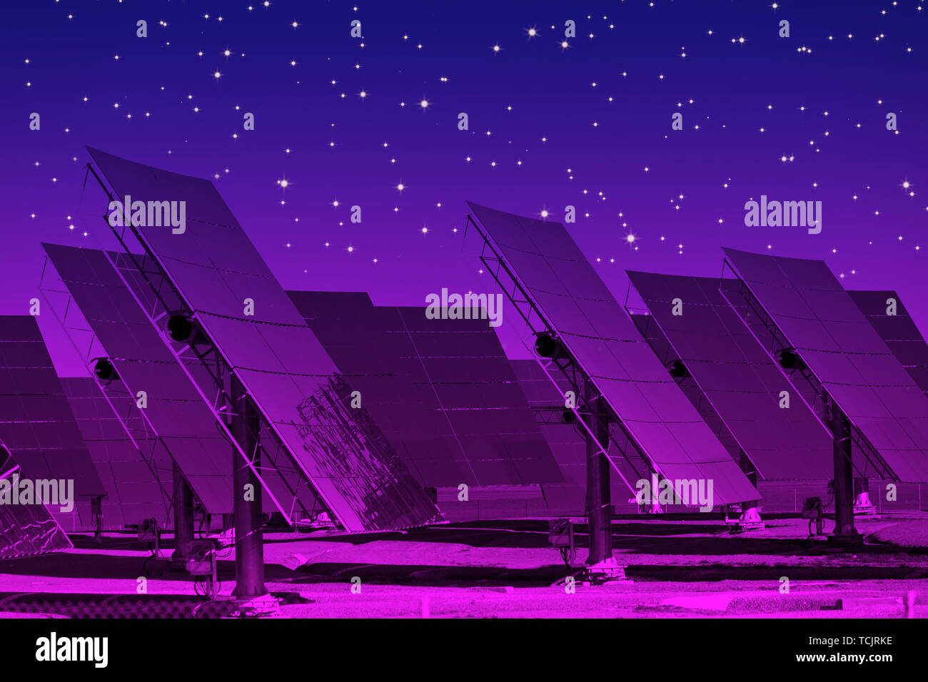 Neon colored Solar panels with copy space on night stars sky background ...