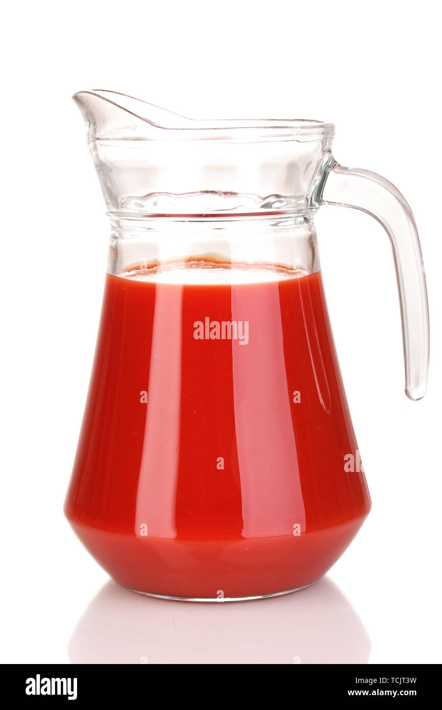 Tomato juice in pitcher isolated on white Stock Photo - Alamy