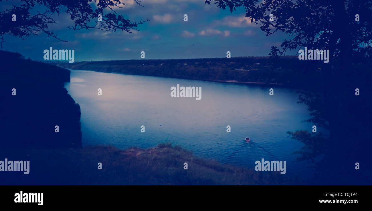 River landscape with sailing yacht at night Stock Photo - Alamy