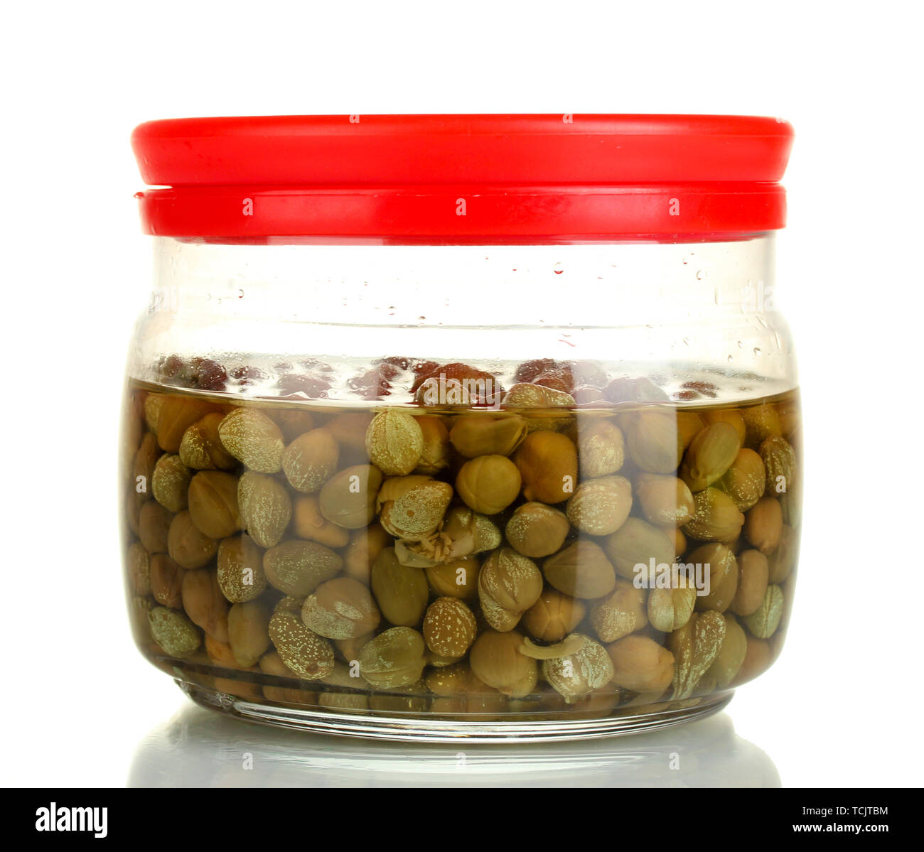 Glass jar with capers isolated on white Stock Photo - Alamy