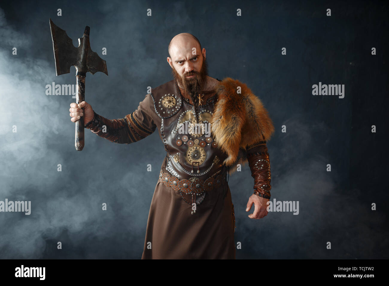 Angry viking with axe, martial spirit, barbarian Stock Photo - Alamy