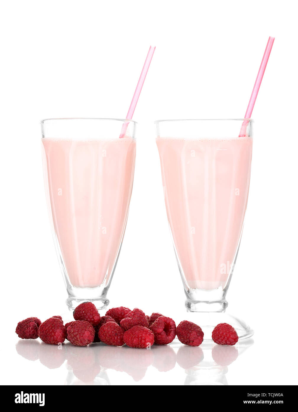 Raspberry milk shakes isolated on white Stock Photo - Alamy