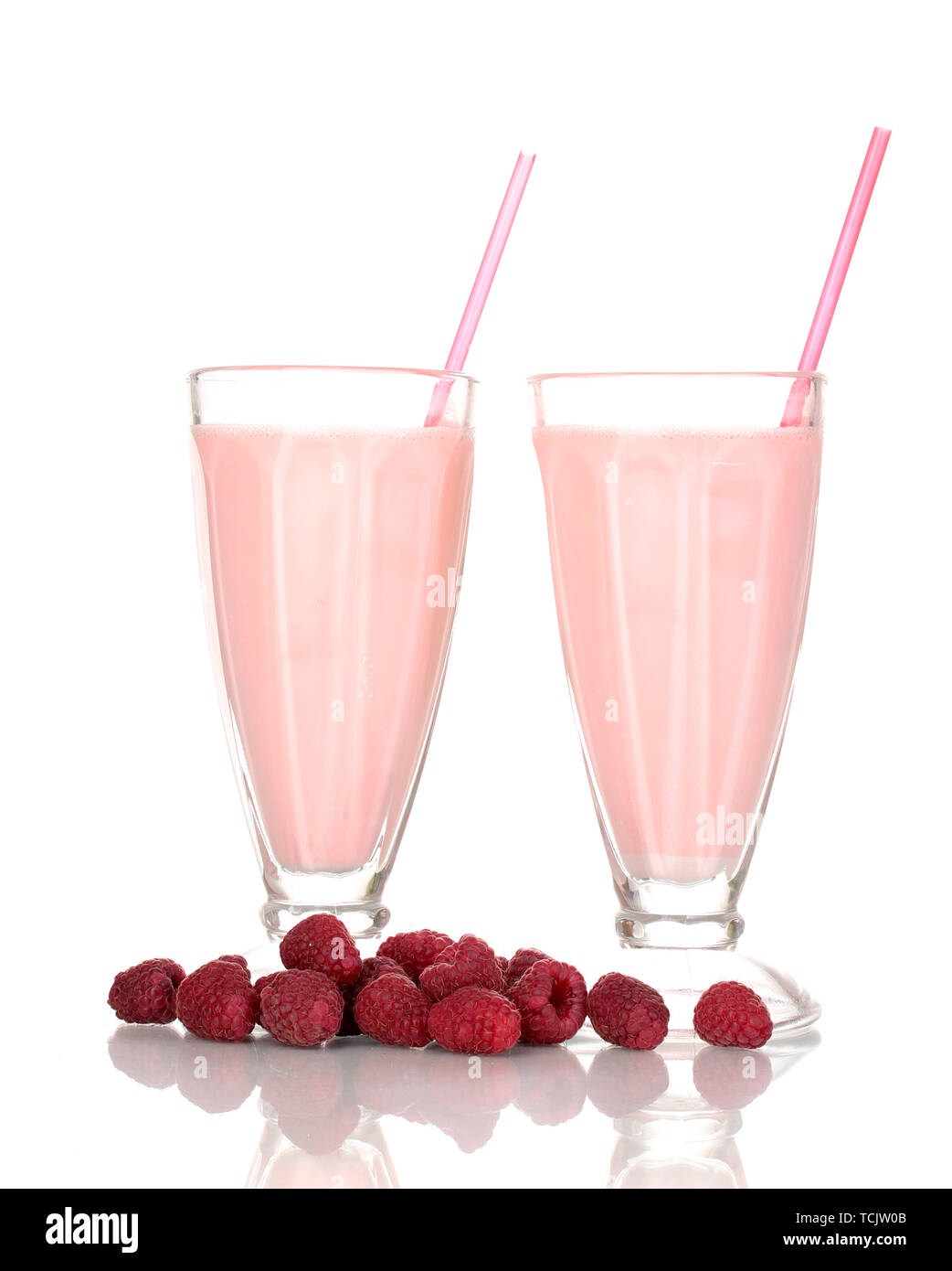 Raspberry milk shakes isolated on white Stock Photo - Alamy