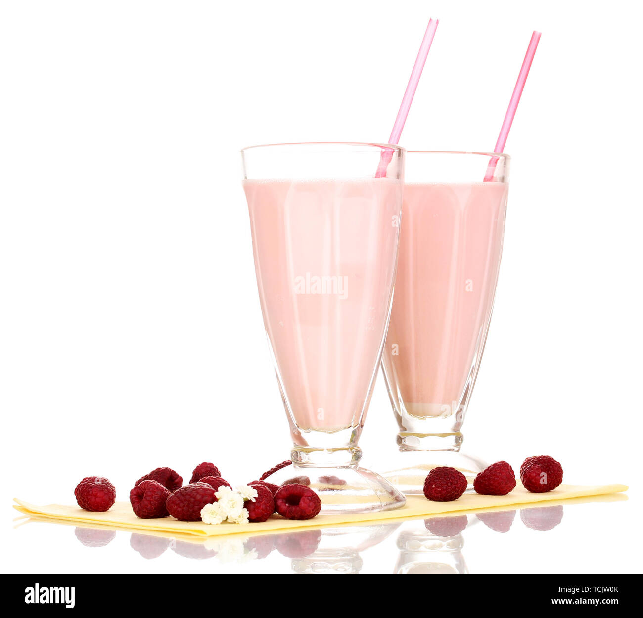 Raspberry milk shakes isolated on white Stock Photo - Alamy