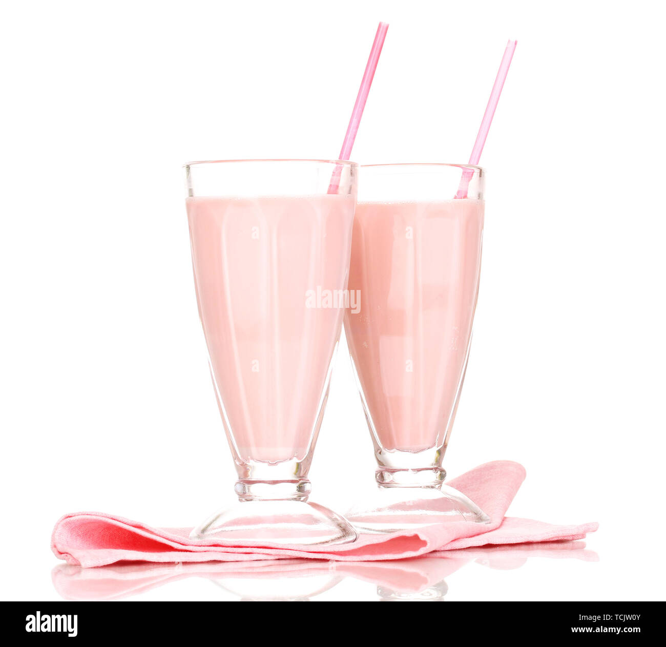 Pink milk shakes isolated on white Stock Photo - Alamy