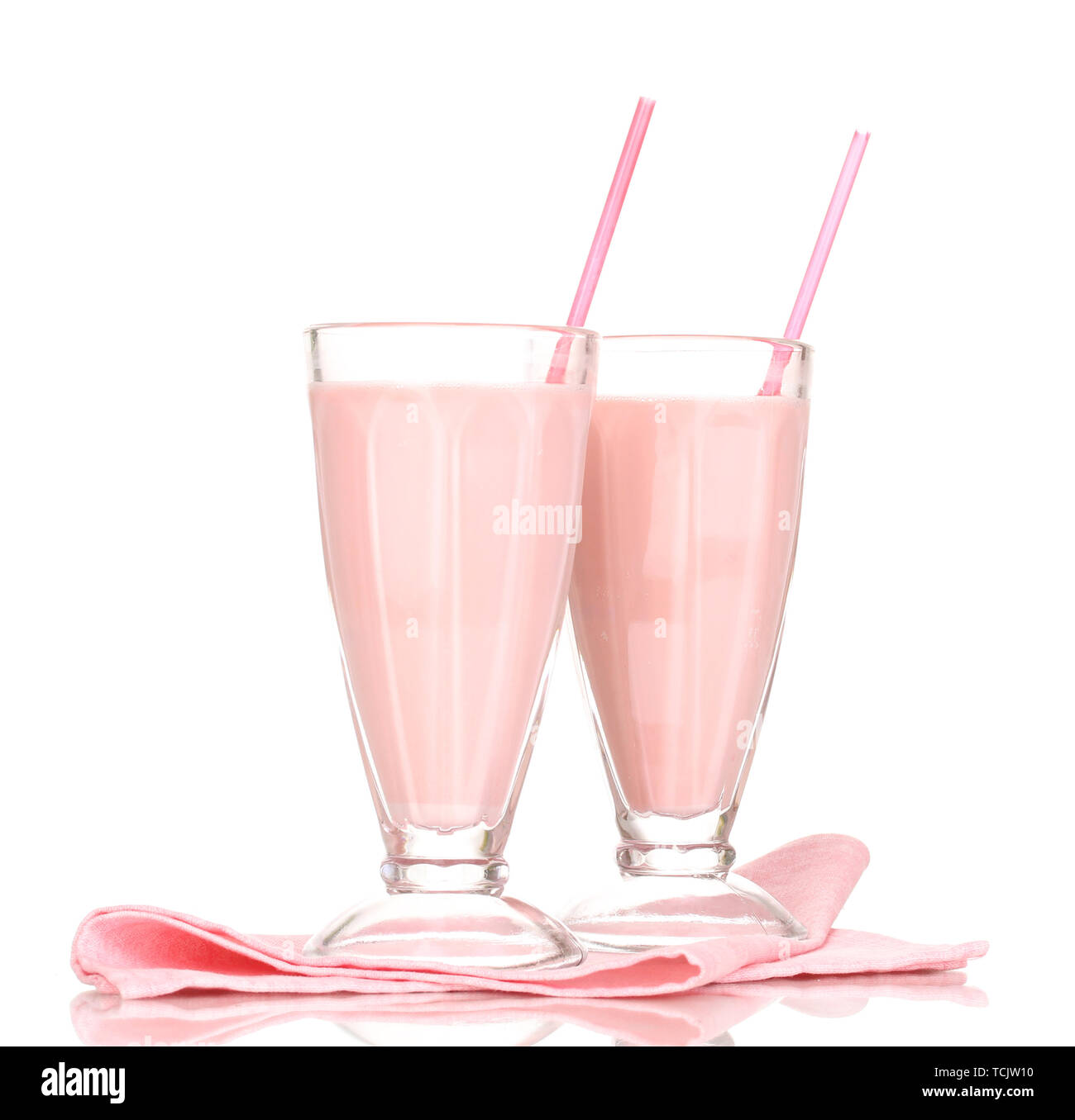Pink milk shakes isolated on white Stock Photo - Alamy