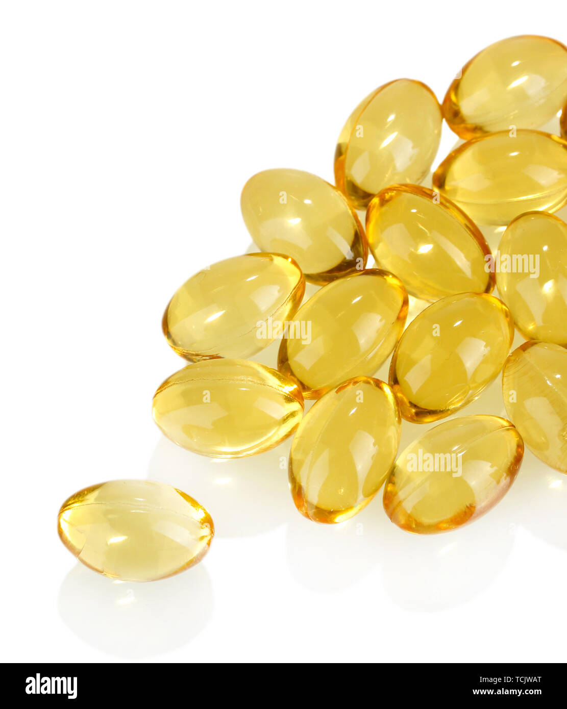 pellets of fish oil on white background close-up Stock Photo - Alamy