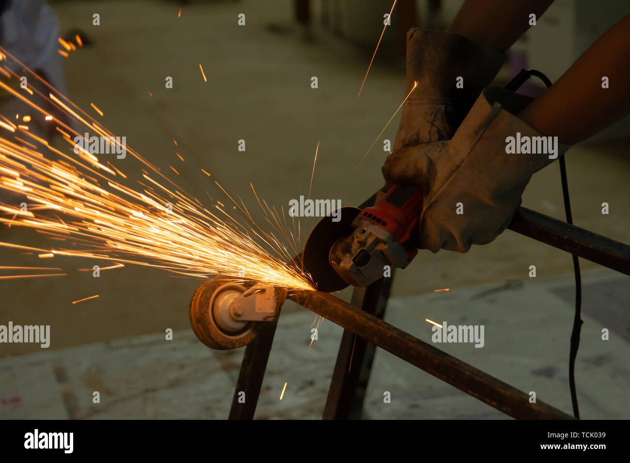 Electric wheel grinding cuting on steel. sparks from cutting Stock ...
