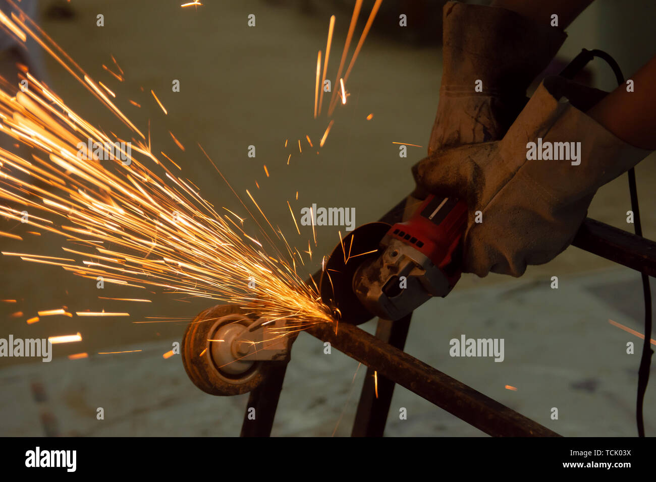 Electric wheel grinding cuting on steel. sparks from cutting Stock ...