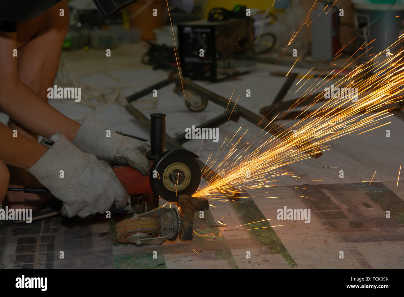 Electric wheel grinding cuting on steel. sparks from cutting Stock ...