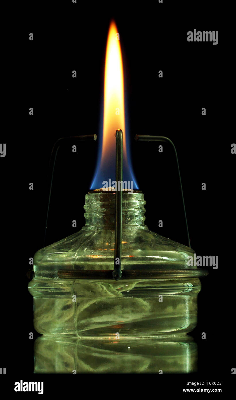 spiritlamp on black background Stock Photo - Alamy