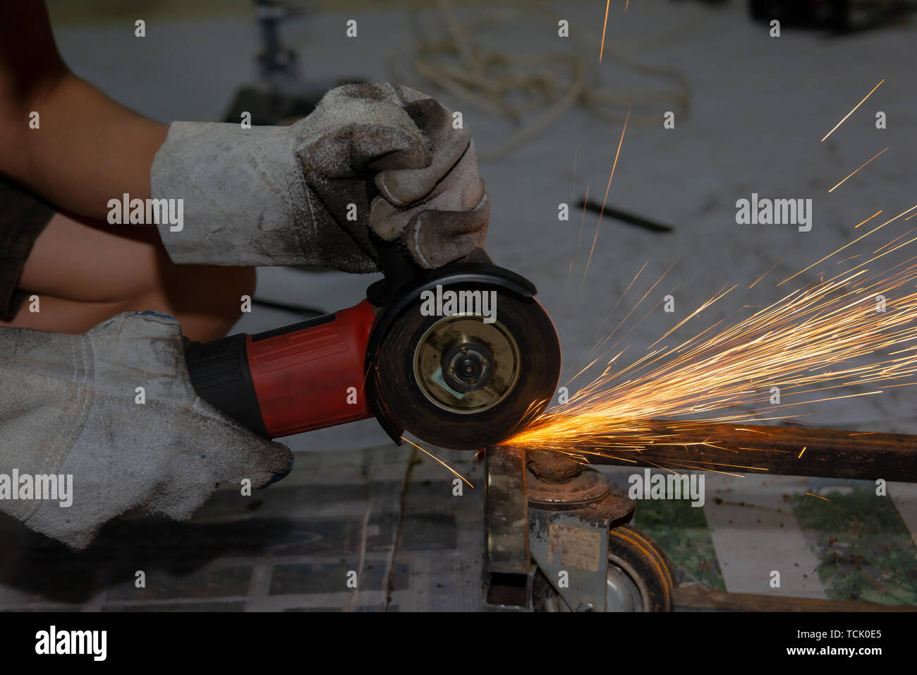 Electric wheel grinding cuting on steel. sparks from cutting Stock ...