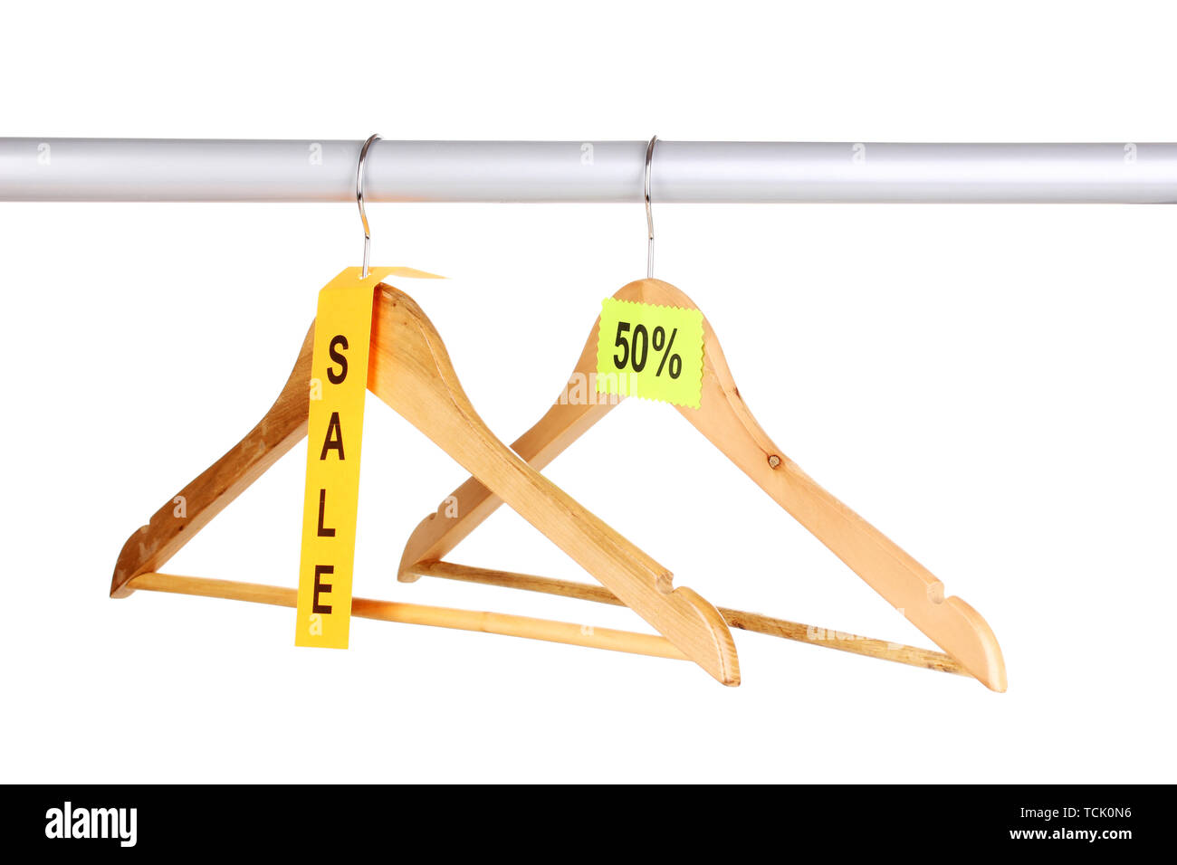 wooden clothes hangers as sale symbol isolated on white Stock Photo - Alamy
