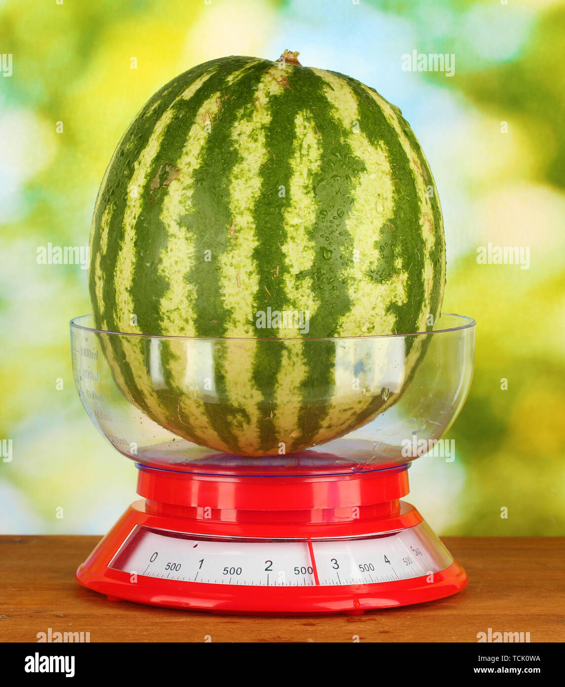 Watermelon on scales hi-res stock photography and images - Alamy