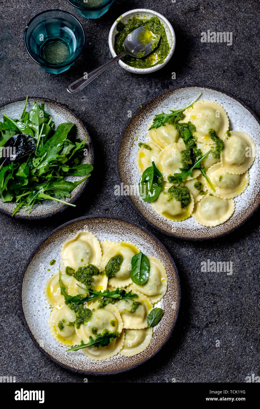 Italian spinach ricotta ravioli, Top view, black background, copy space ...