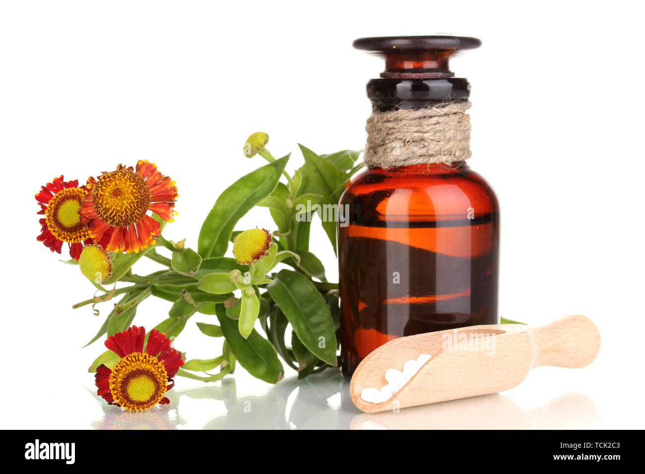medicine bottle with tablets and flowers isolated on white Stock Photo ...