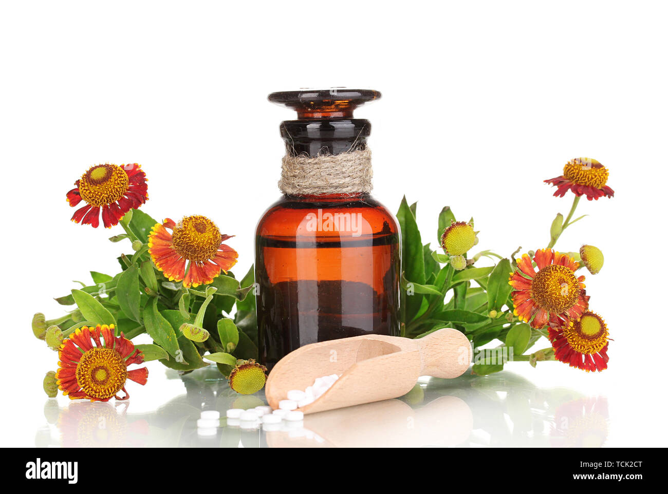medicine bottle with tablets and flowers isolated on white Stock Photo ...