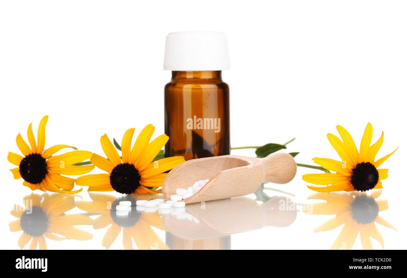 medicine bottle with tablets and flowers isolated on white Stock Photo ...