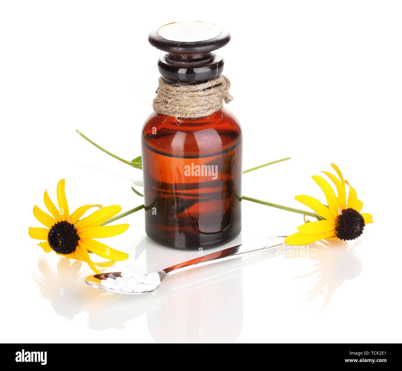 medicine bottle with tablets and flowers isolated on white Stock Photo ...