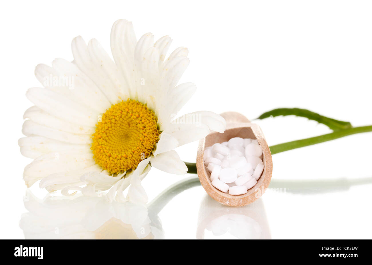 homeopathic tablets and flower isolated on white Stock Photo - Alamy