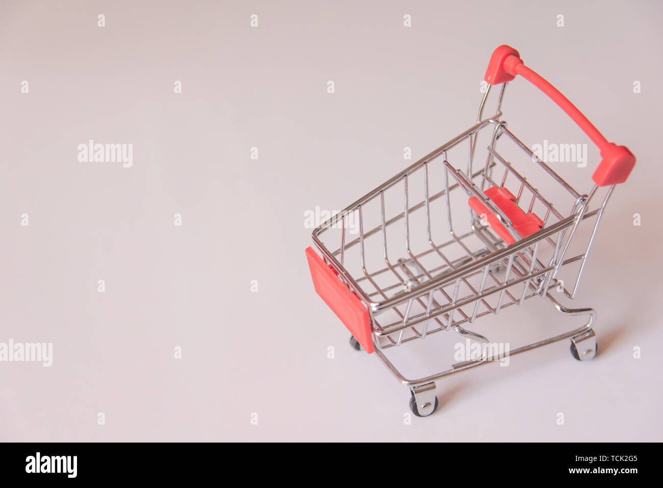 Red shopping supermarket cart on white background with copy space Stock ...