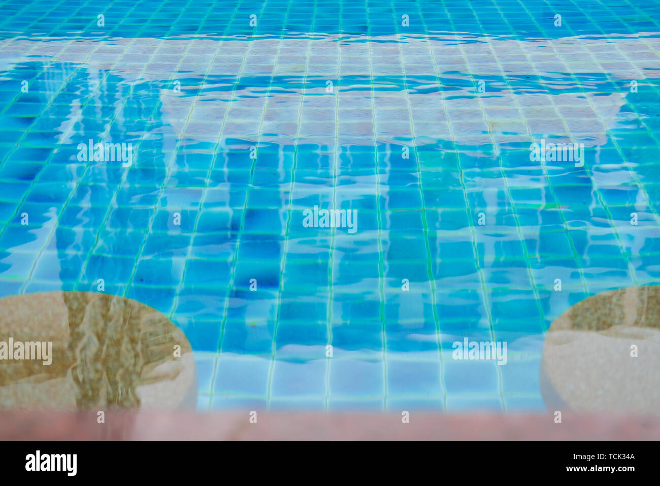 water surface of green swimming pool in hotel Stock Photo - Alamy