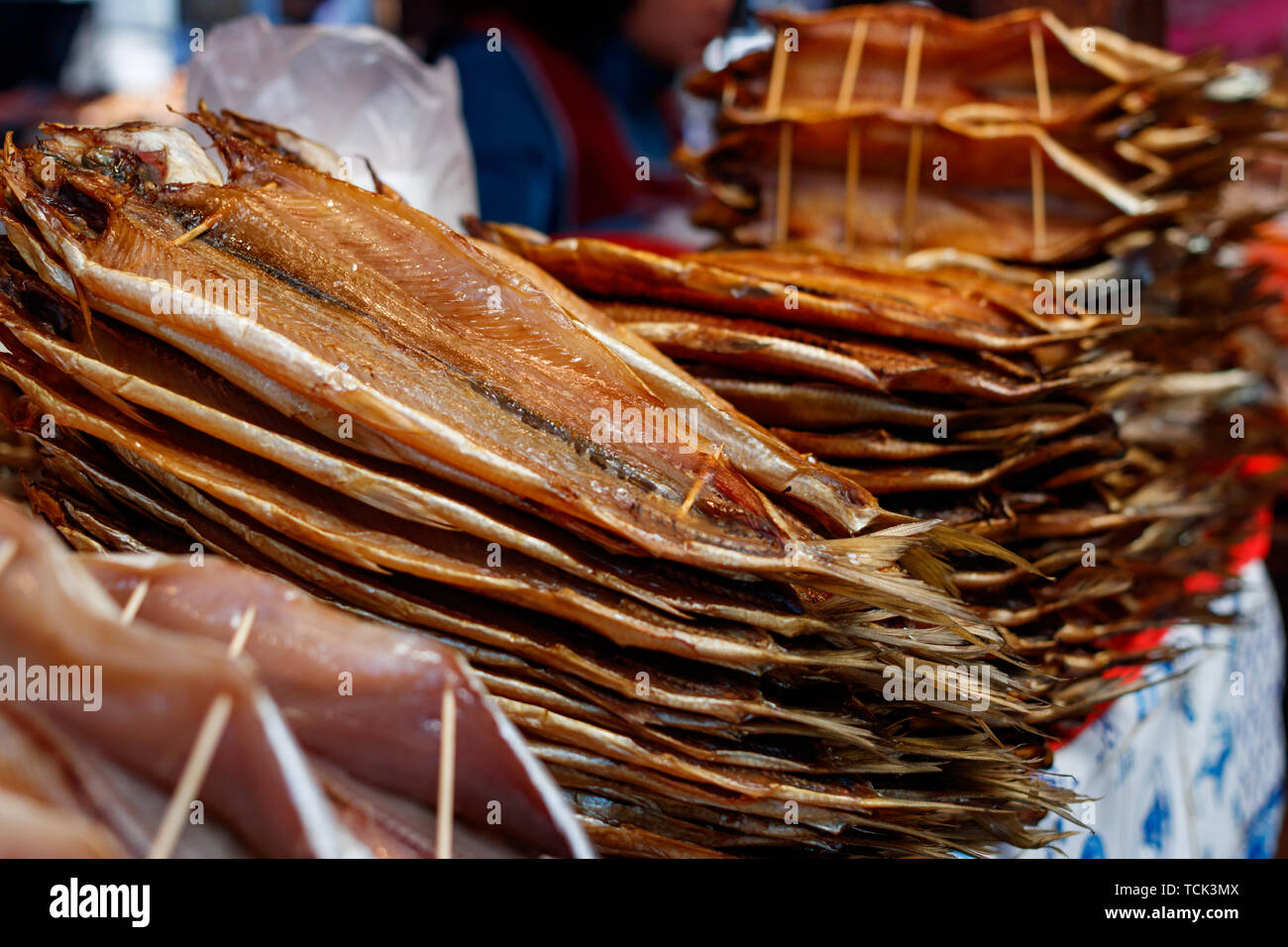 Baikal fish hot smoked and dried on the street market. Listvyanka ...