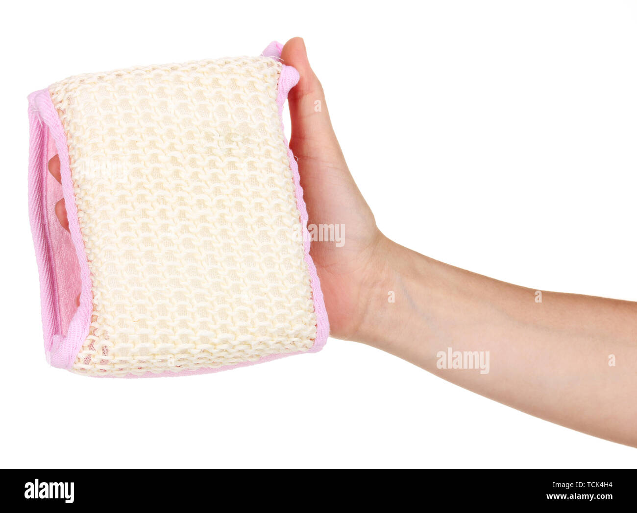 Sponges for bathing on hand isolated on white Stock Photo - Alamy