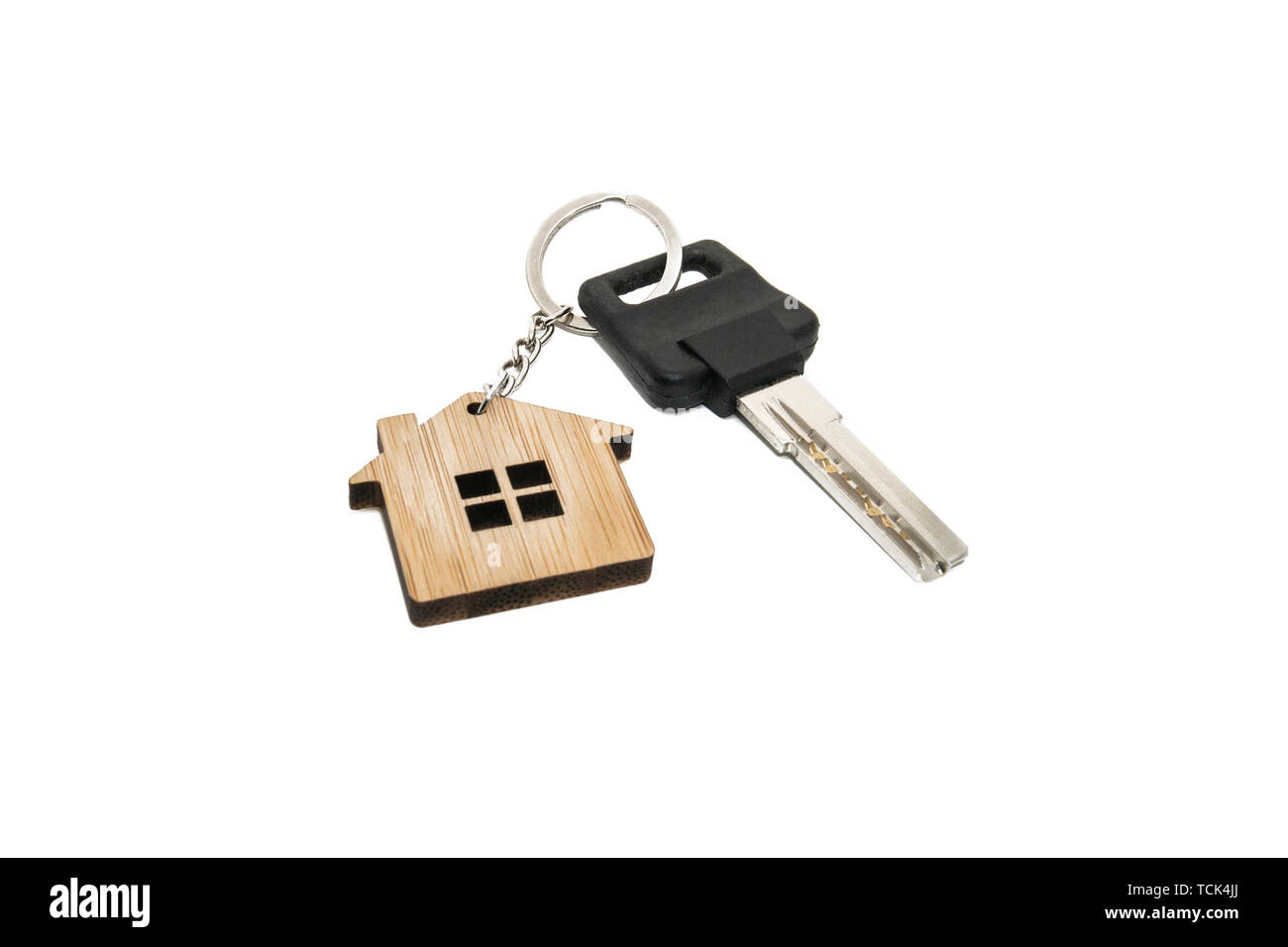House keys with house shaped keychain, isolated on white background ...