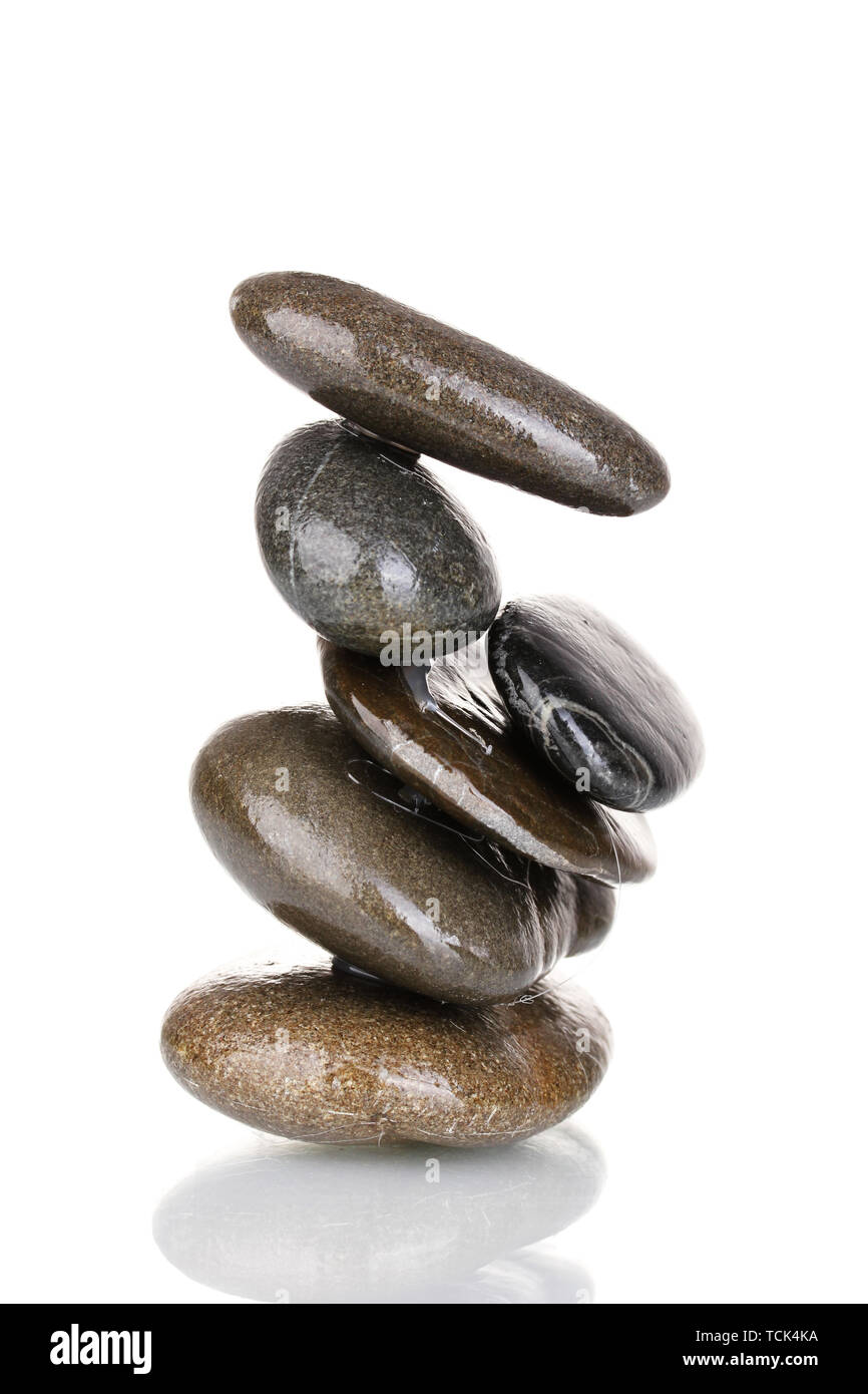 Stack of balanced stones isolated on white Stock Photo - Alamy