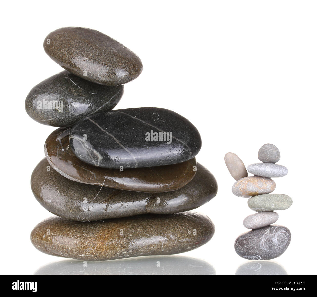 Stacks of balanced stones isolated on white Stock Photo - Alamy